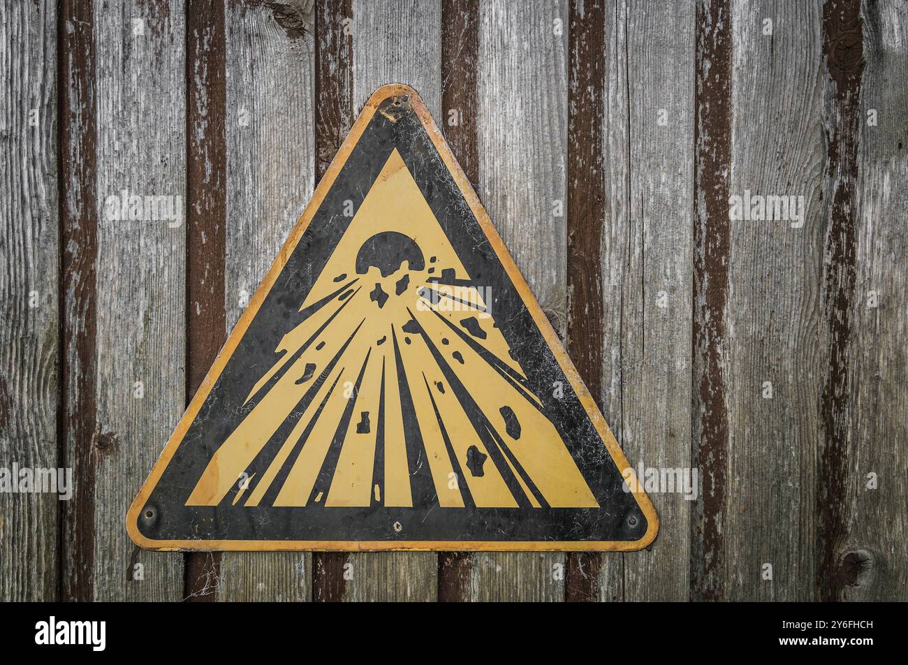 Explosives sign on a weatered wooden door Stock Photo - Alamy