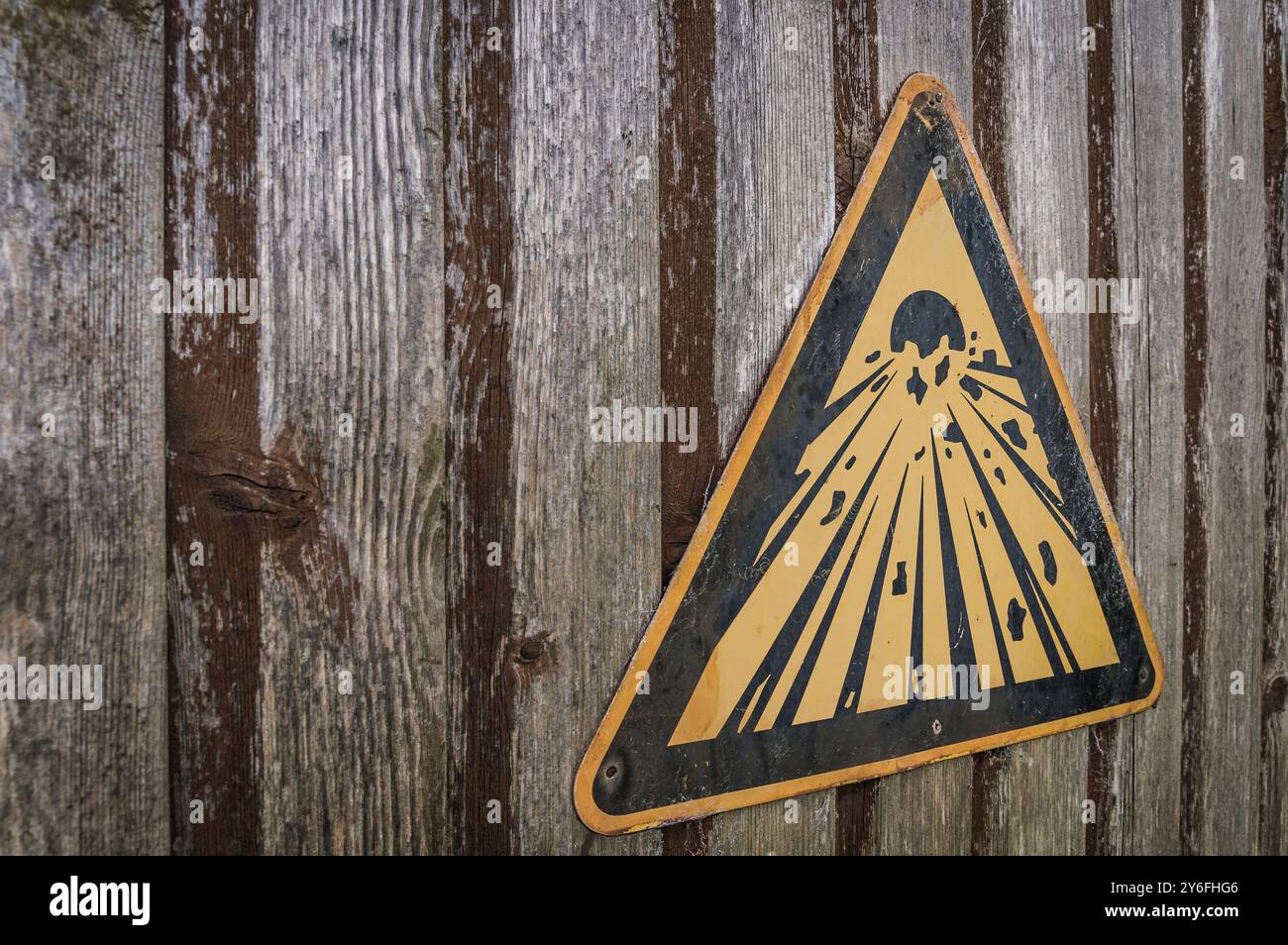 Explosives sign on a weatered wooden door Stock Photo - Alamy