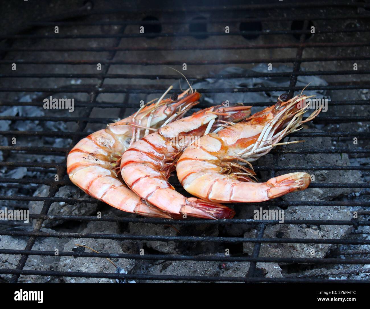 Cooking tiger prawns grilled. Close-up. Background. Outdoor Stock Photo ...