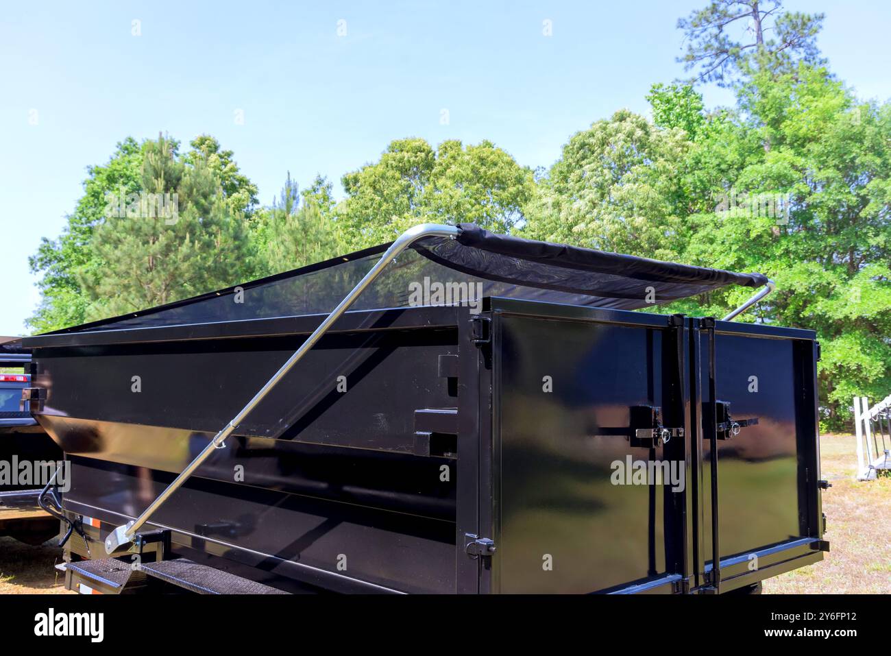 Construction waste being unloaded from truck lorry for transportation ...