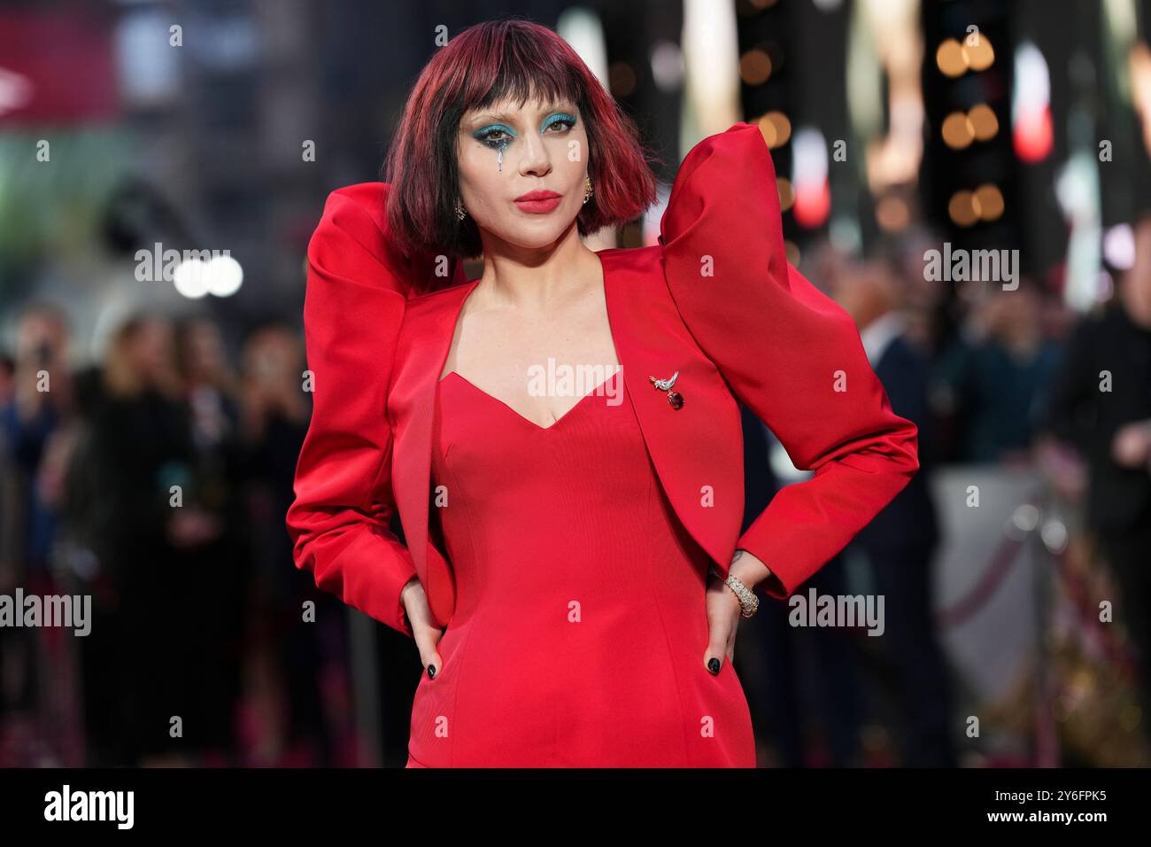 Lady Gaga poses for photographers upon arrival at the premiere for the ...