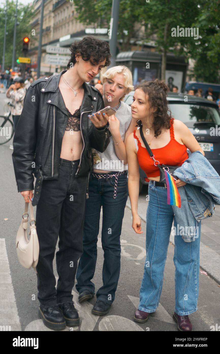 Young Activists with Pride Flags during Gay parade in Paris Stock Photo ...