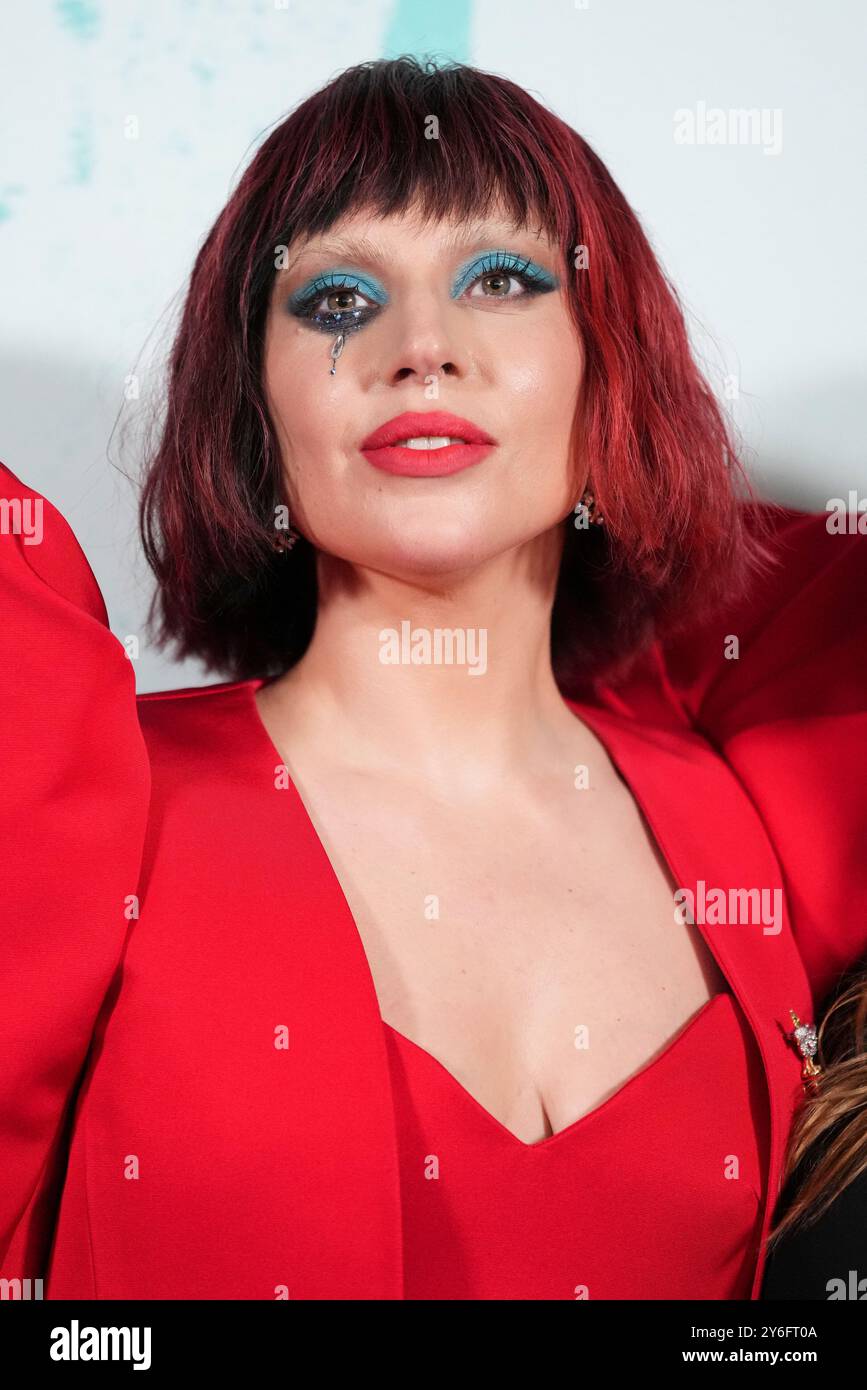Lady Gaga poses for photographers upon arrival at the premiere for the ...