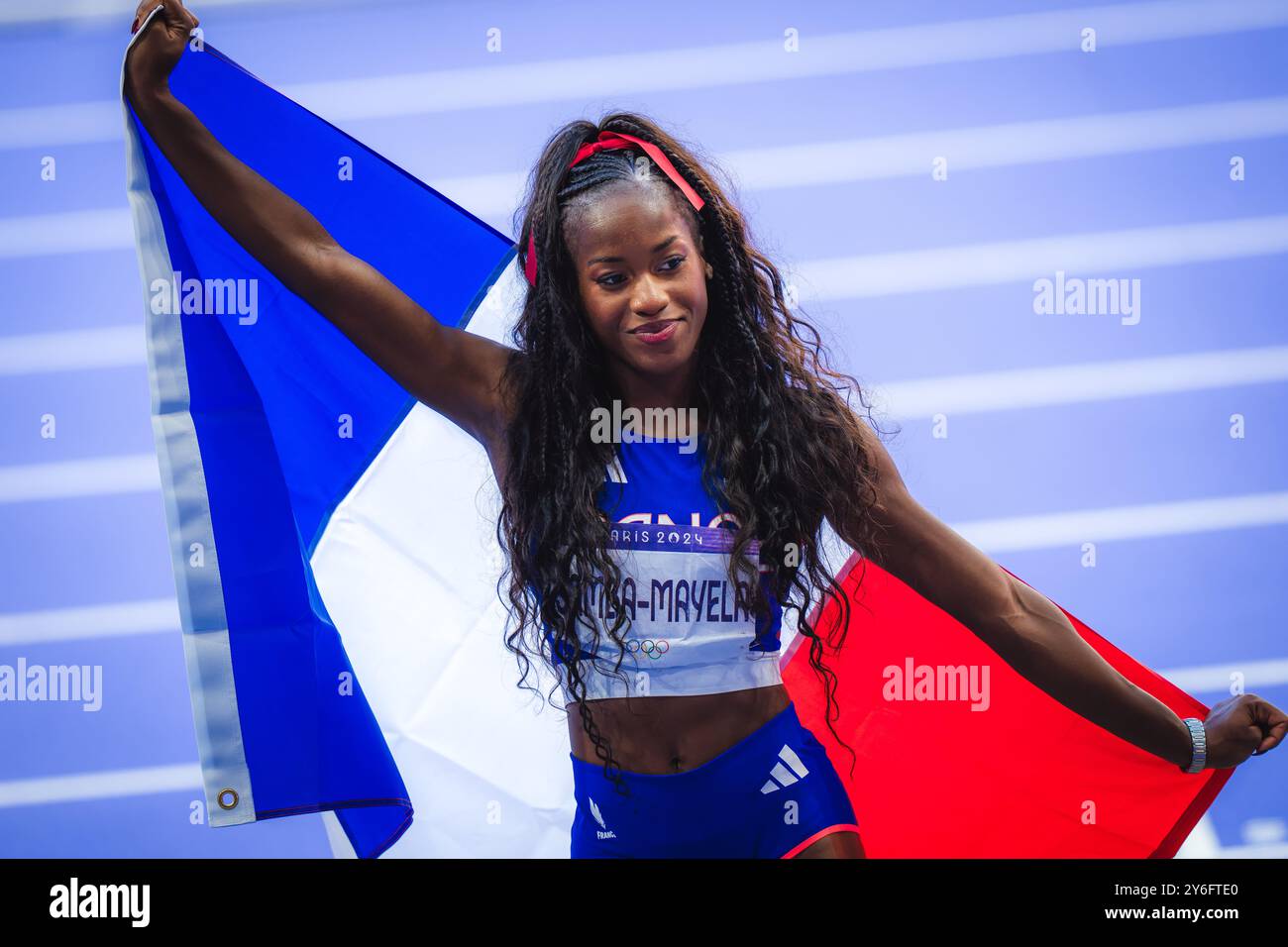 Cyréna Samba-Mayela celebrating with the flag of their country in the ...
