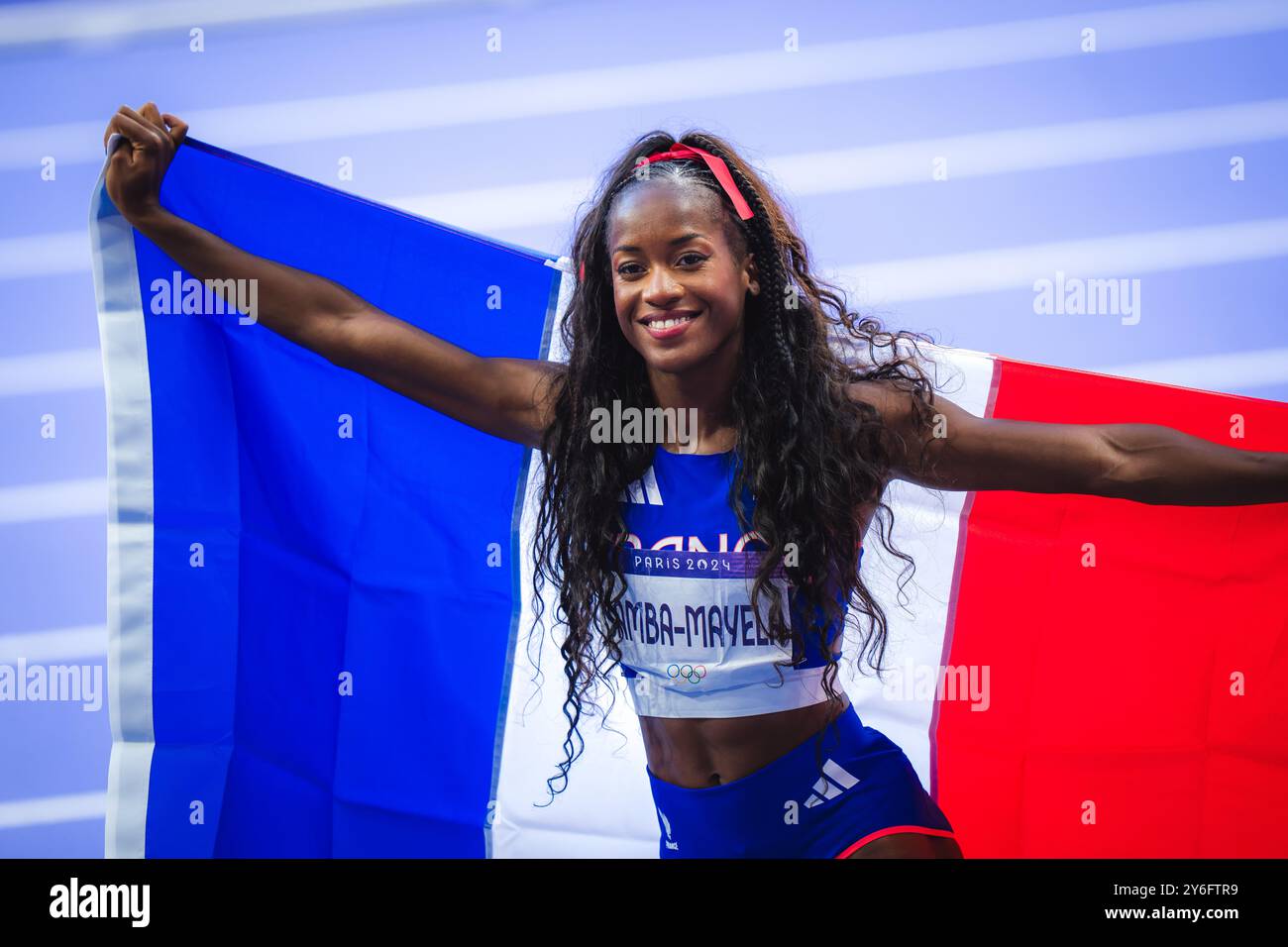 Cyréna Samba-Mayela celebrating with the flag of their country in the ...