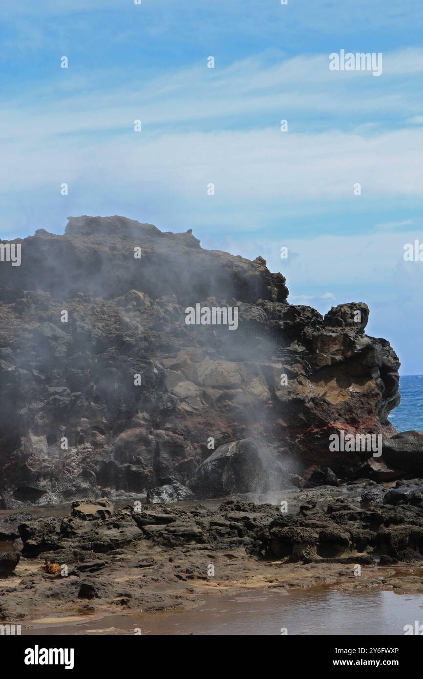 Mist of water, hanging in the air, after an eruption at the Nakalele ...