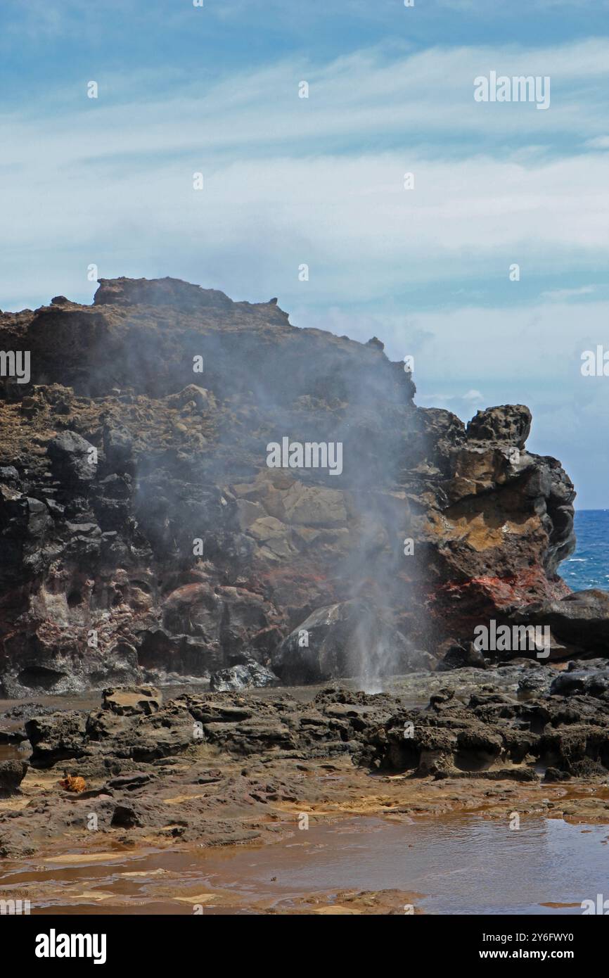 Mist of water, hanging in the air, after an eruption at the Nakalele ...