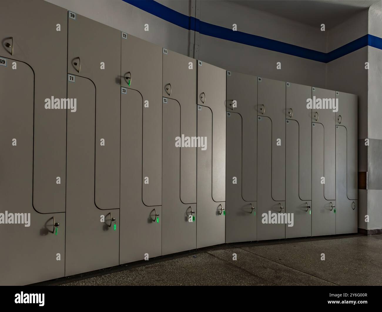 Gray lockers for clothes, lockable shelves, lockers for students at ...