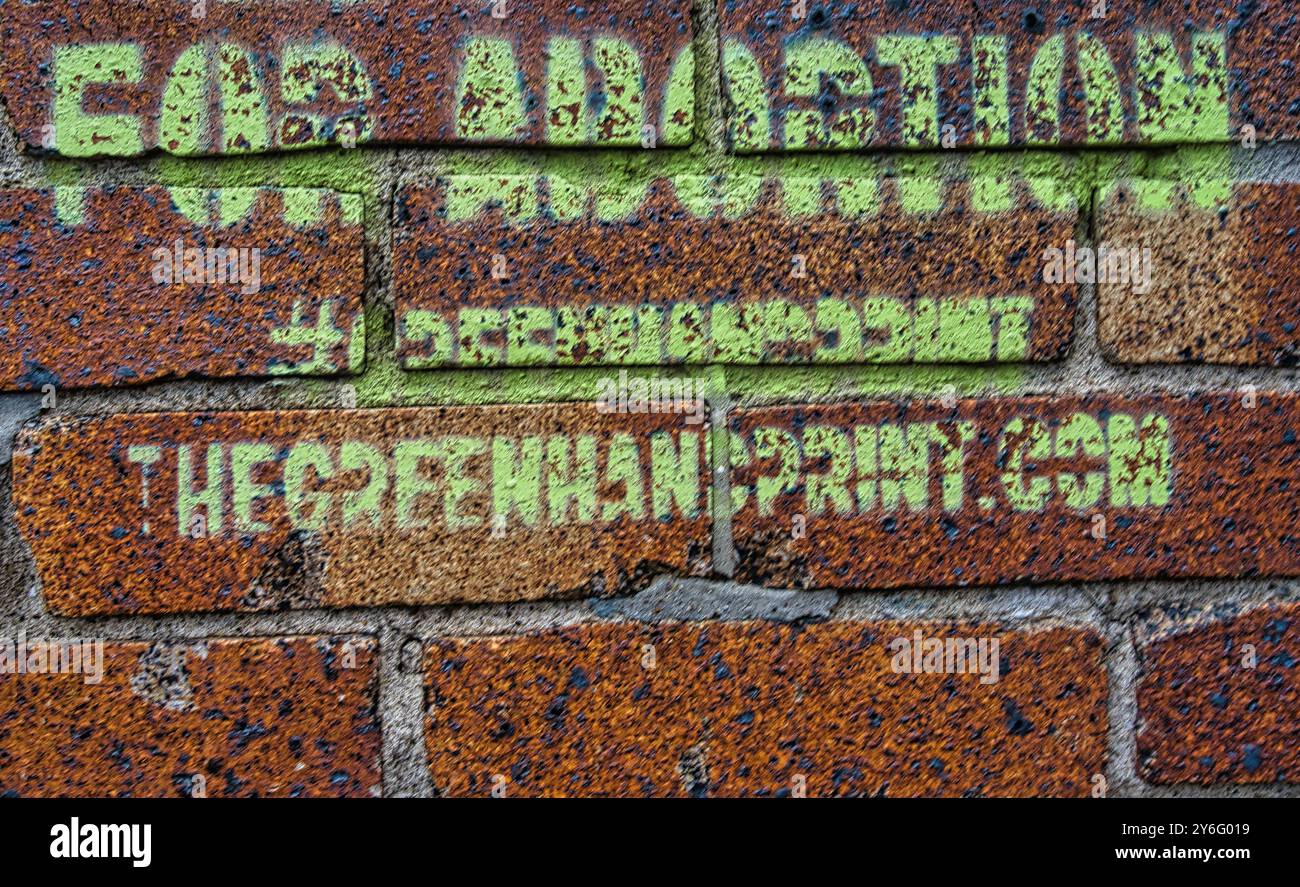 A pro abortion sign form the Green Hand painted on a brick wall Stock ...