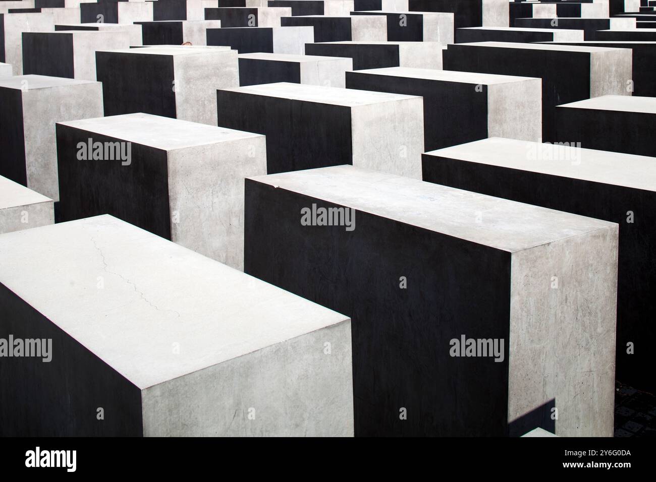 This memorial features numerous stark concrete slabs arranged in a grid ...