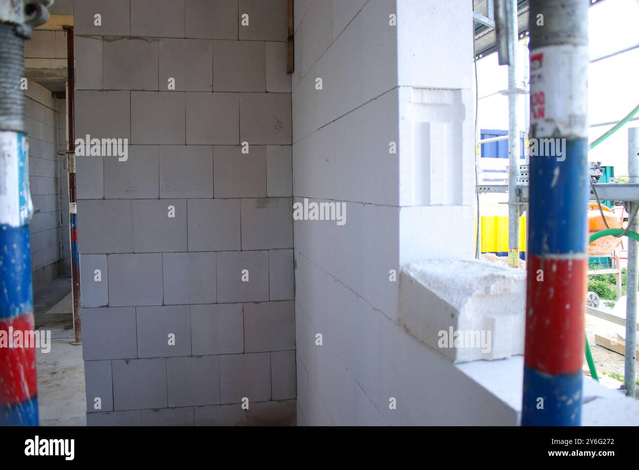 Inside view of a new building with white stone walls concrete and ...