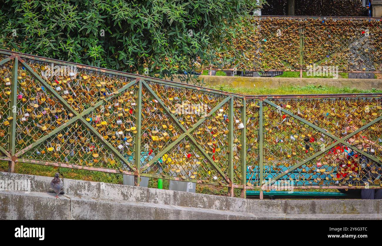 Love locks attached to a fence on Montmartre hill next to The Basilica ...