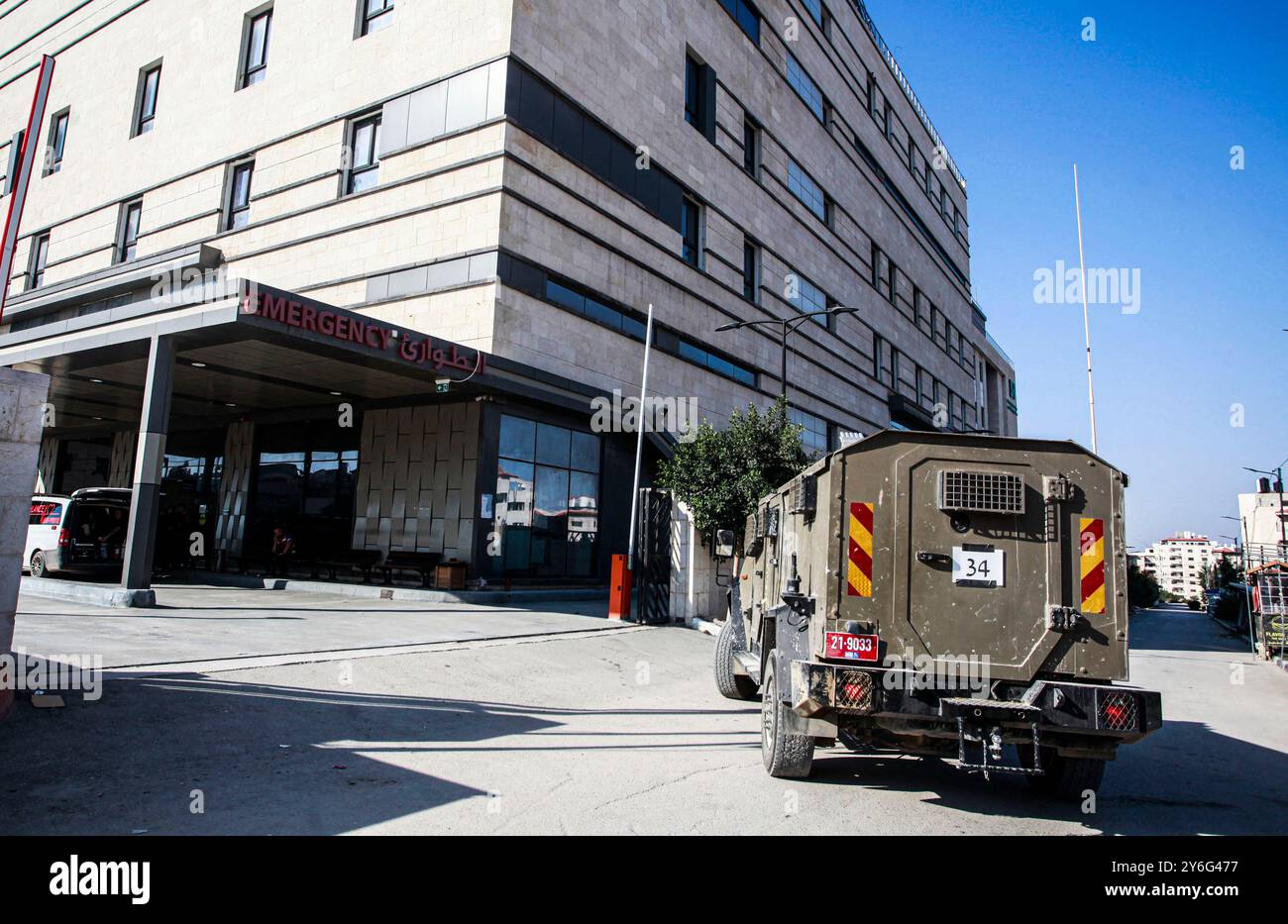 Jenin, Palestine. 25th Sep, 2024. An Israeli military vehicle blocks ...