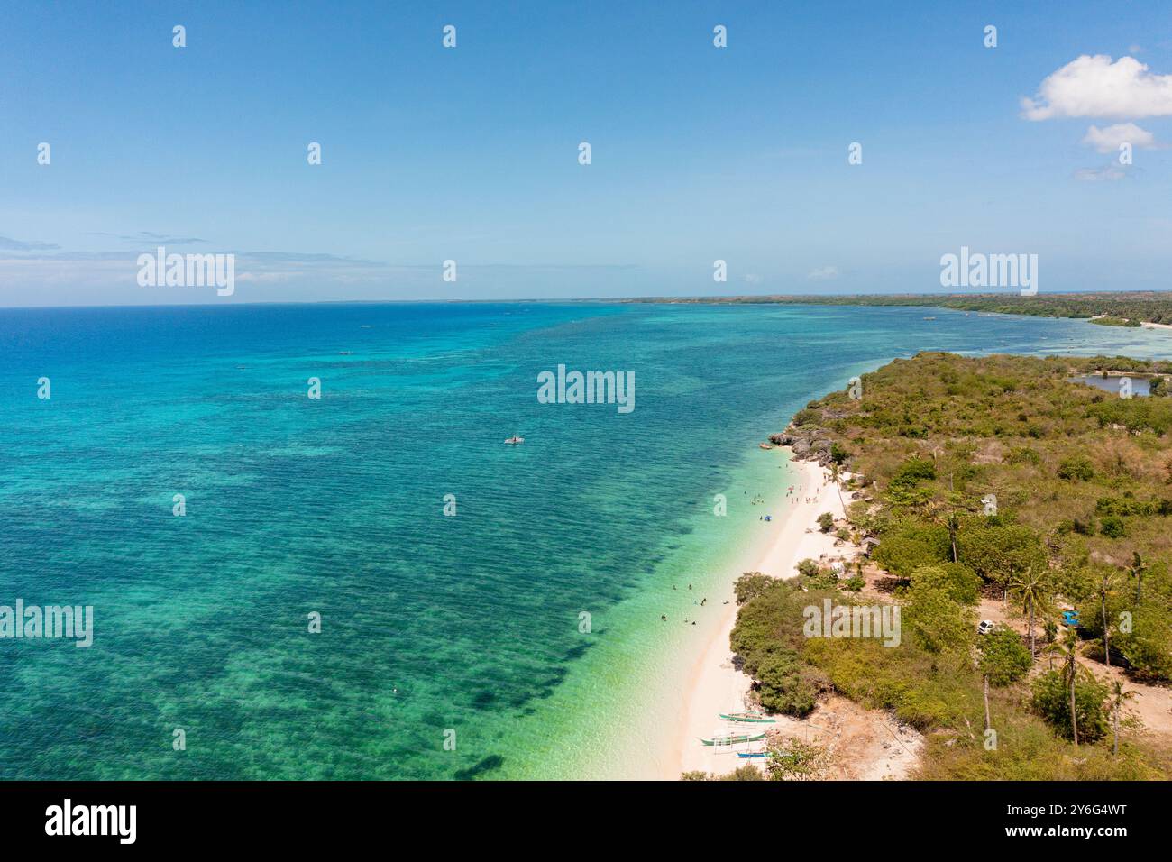 Aerial view of Sandira Beach with white sand beaches. Bantayan Island ...