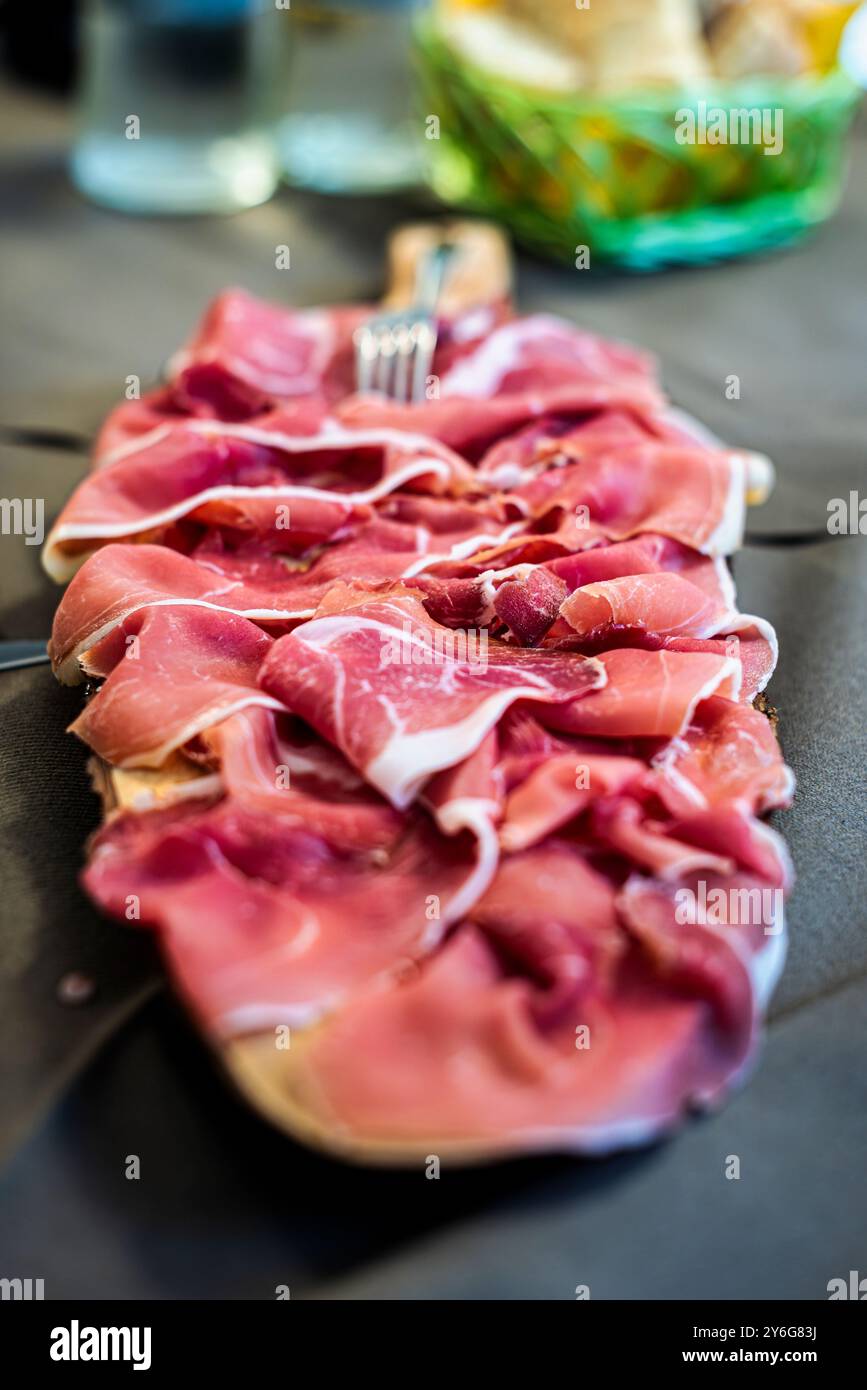 Ham slices Board, a classical cold cuts appetizer Stock Photo - Alamy