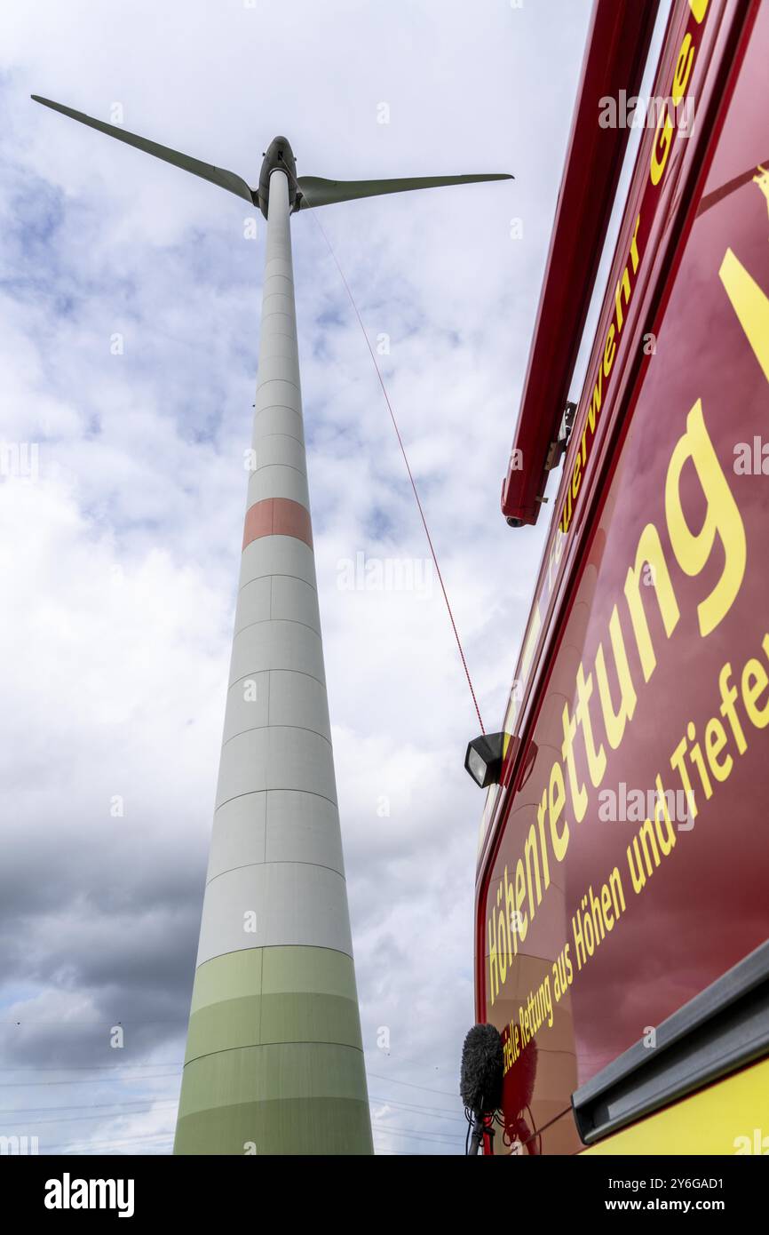 Height rescuers from the Gelsenkirchen fire brigade practise abseiling ...