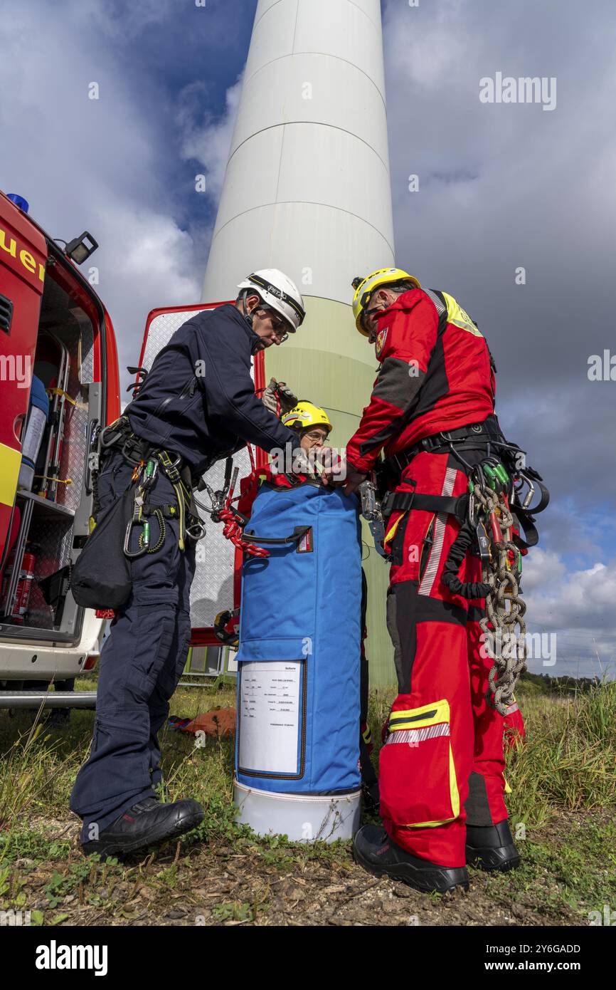 Height rescuers from the Gelsenkirchen fire brigade practise abseiling ...