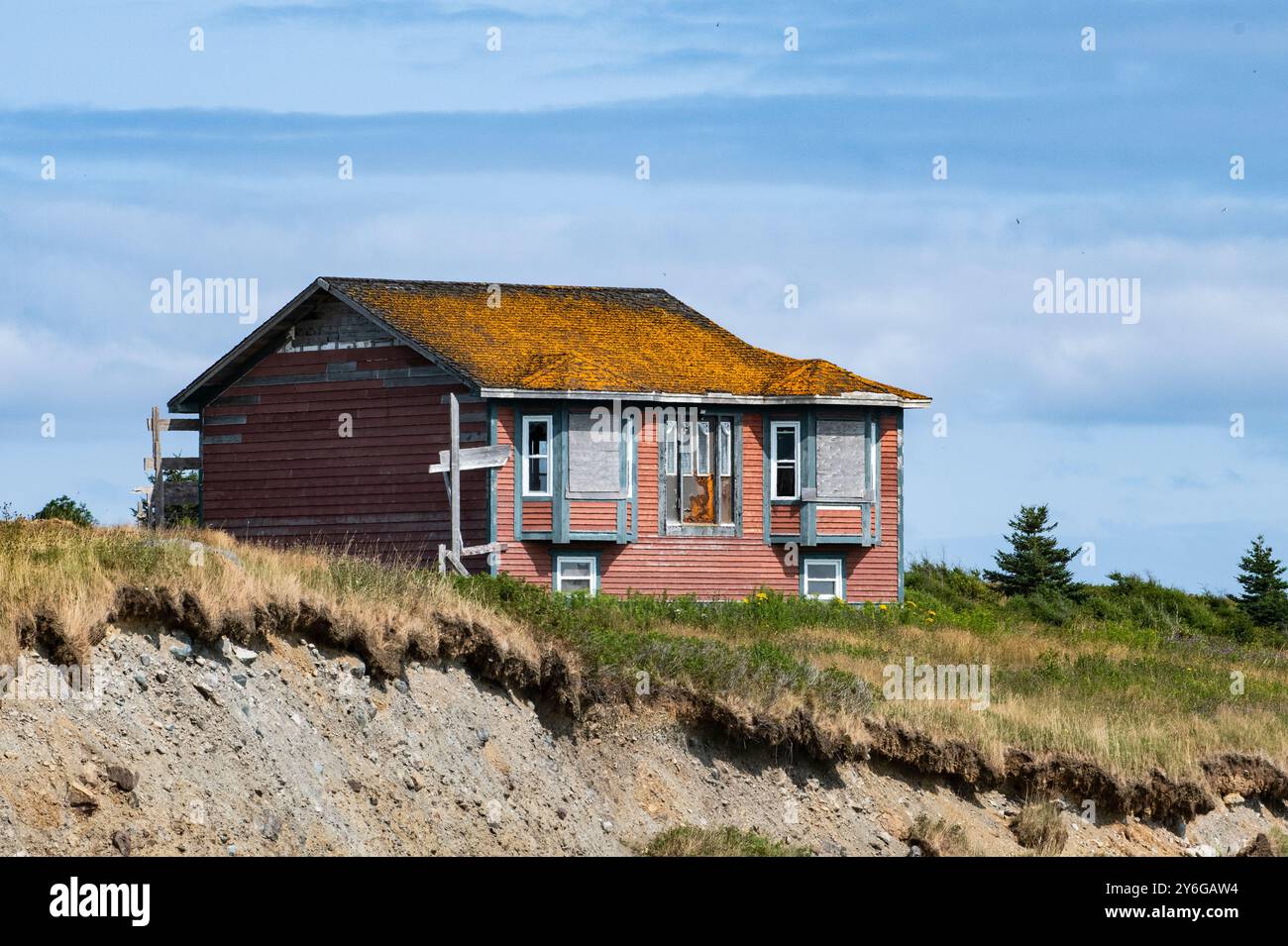 Abandoned dilapidated wooden red fixer upper by the beach in Witless ...