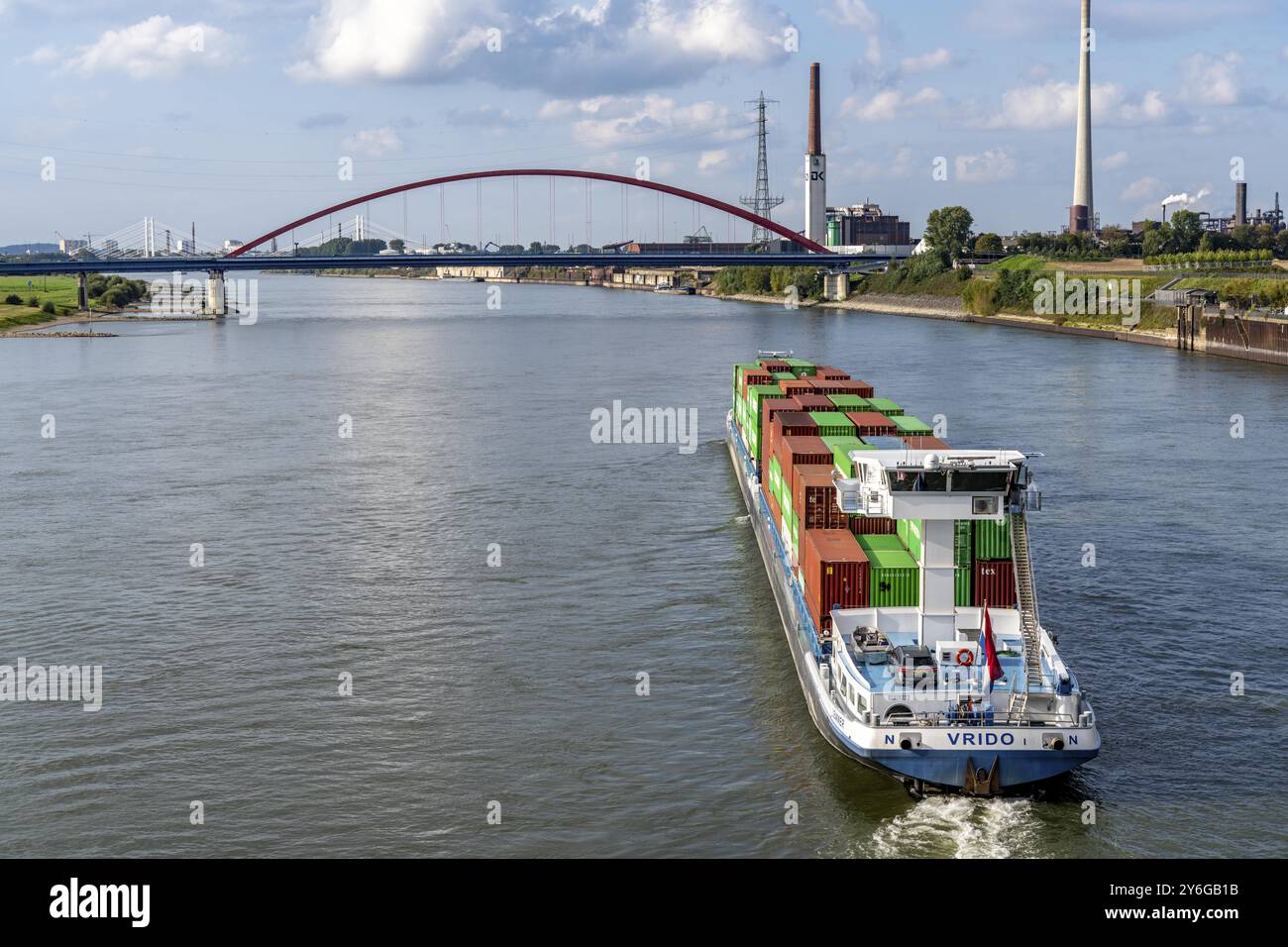 The Dutch cargo ship Vrido, loaded with containers, on the Rhine near ...