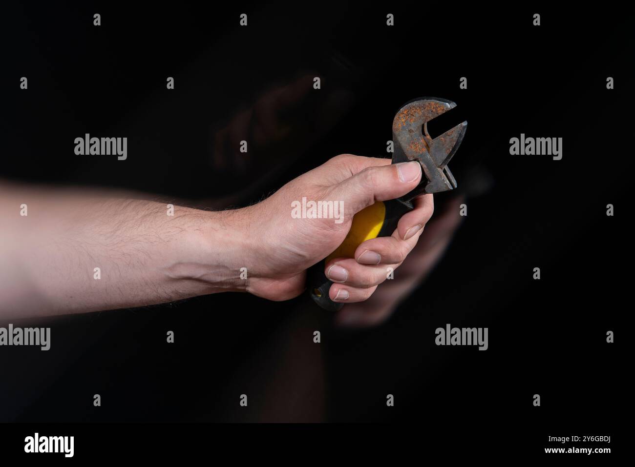 Hand mechanic holding wrench hi-res stock photography and images - Alamy
