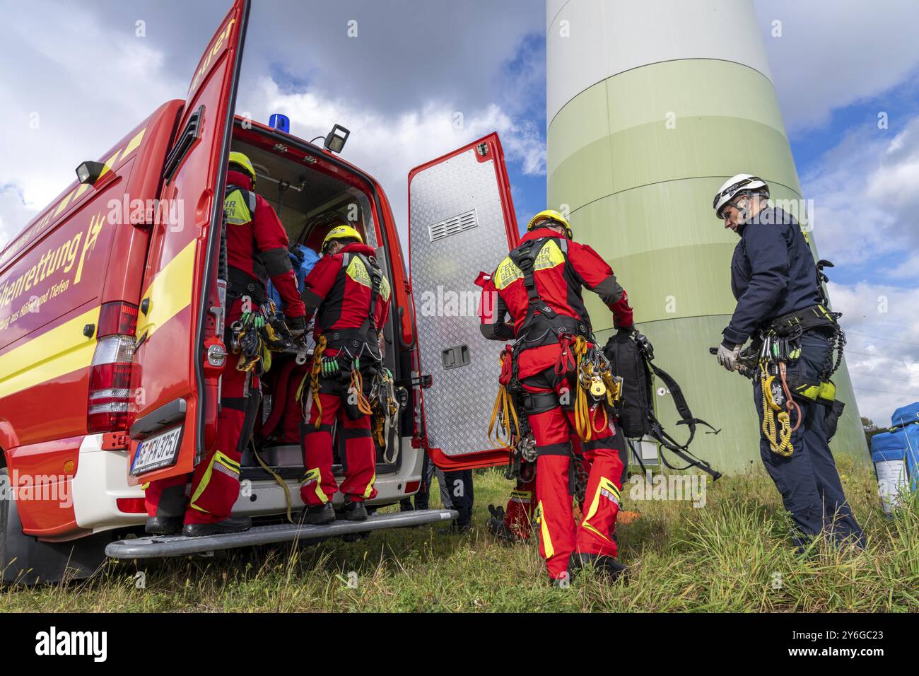 Height rescuers from the Gelsenkirchen fire brigade practise abseiling ...