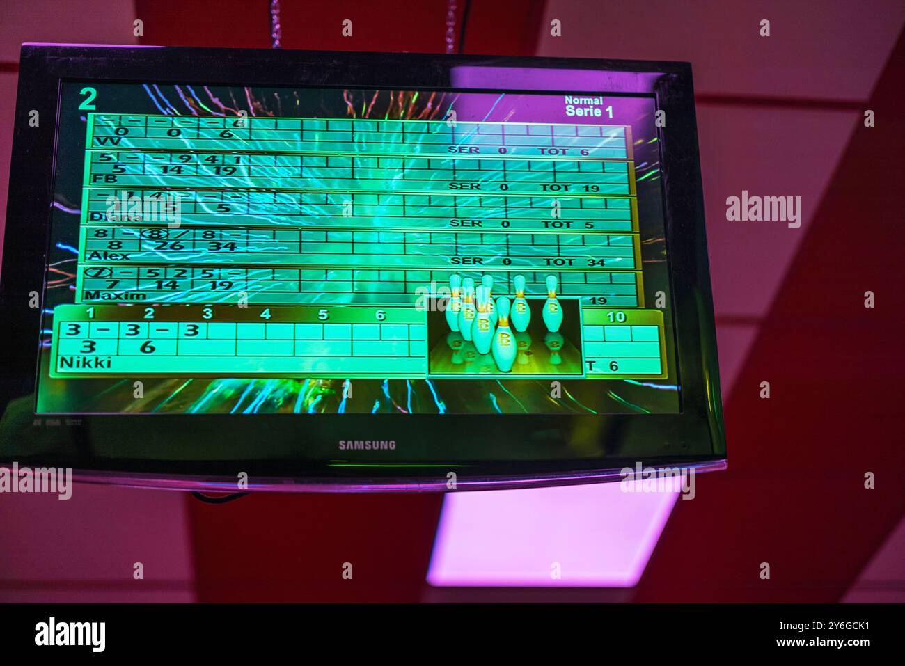 Bowling score screen displaying player names and scores during an ...