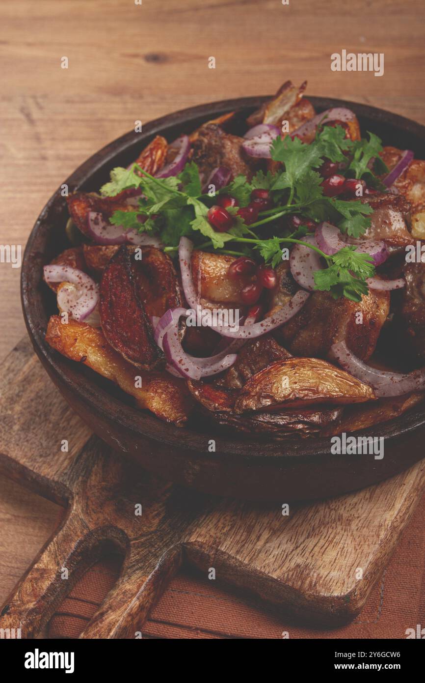 Food photography, Ojakhuri, a traditional Georgian dish, fried potatoes ...