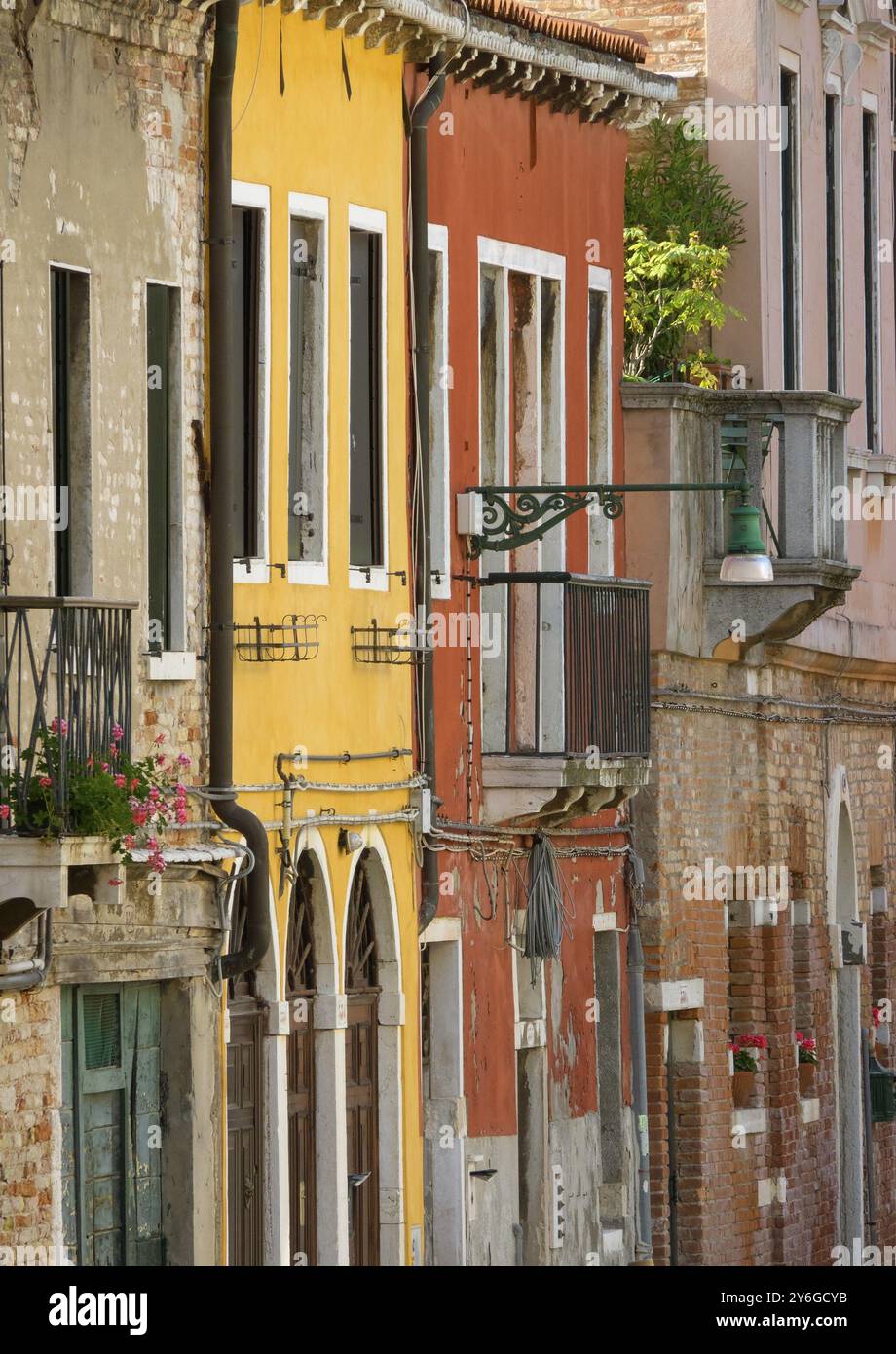 Multi-colored walls of houses in Venice, Italy, Europe Stock Photo - Alamy