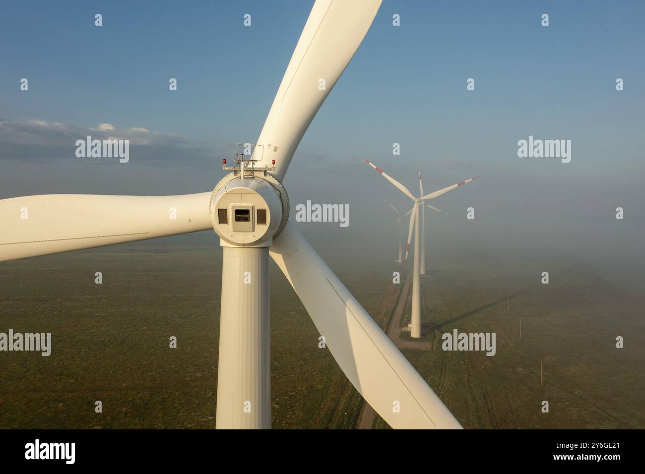 Wind power stations in the morning hi-res stock photography and images ...