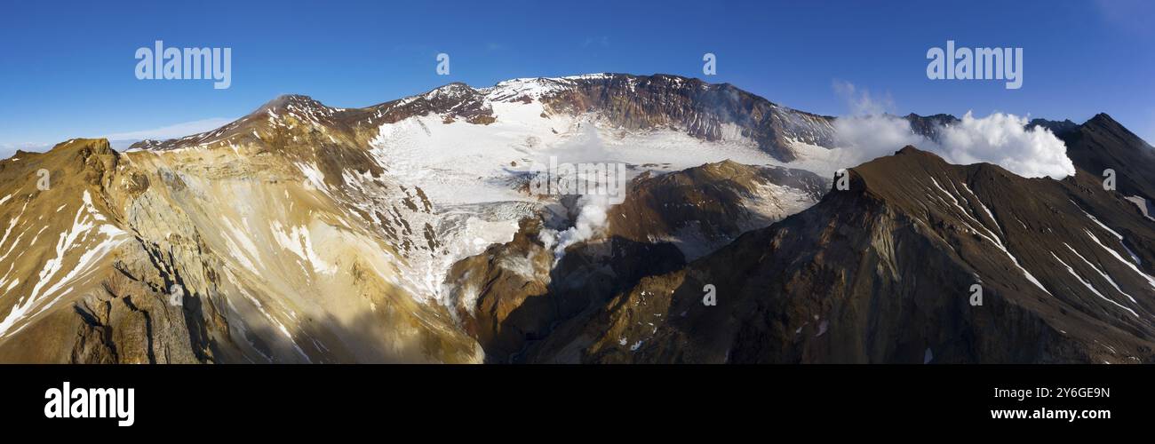 Aerial panorama of crater with fumaroles of active Mutnovsky volcano ...