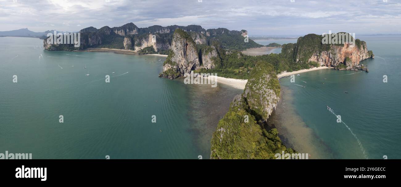 Aerial panorama of tropical turquoise lagoon, beach between rocks and ...