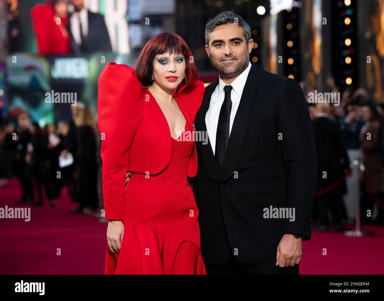 Lady Gaga, left, and Michael Polansky pose for photographers upon ...