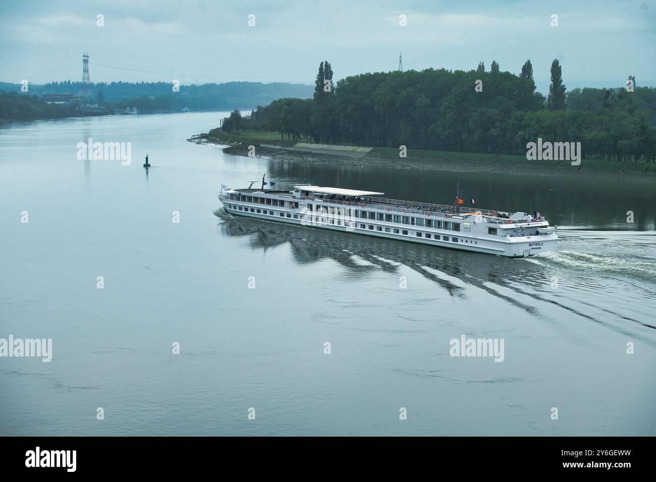 A cruise boat passes Le Trait, France, Seine-Maritime department ...