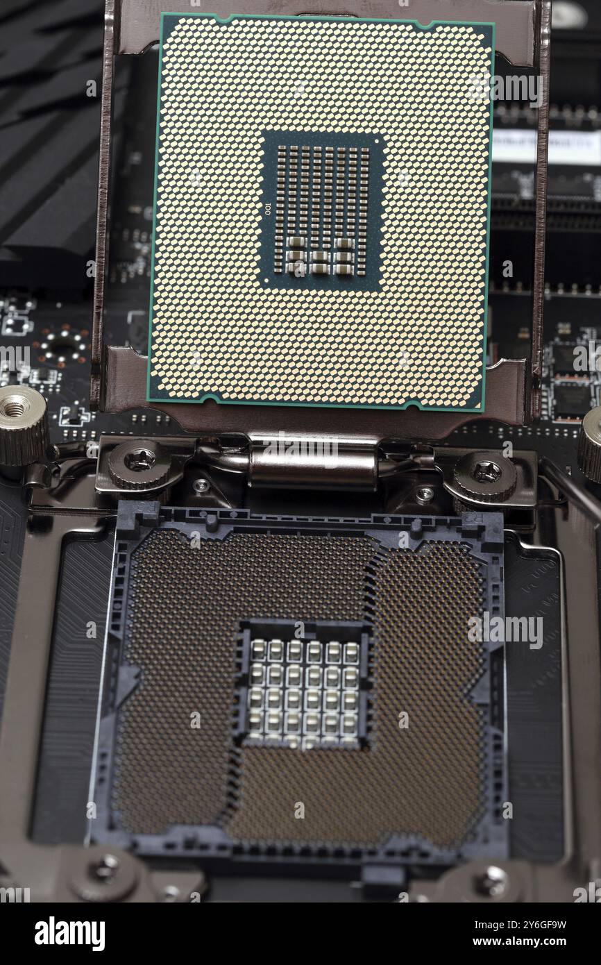 Modern central processor unit on motherboard Stock Photo - Alamy