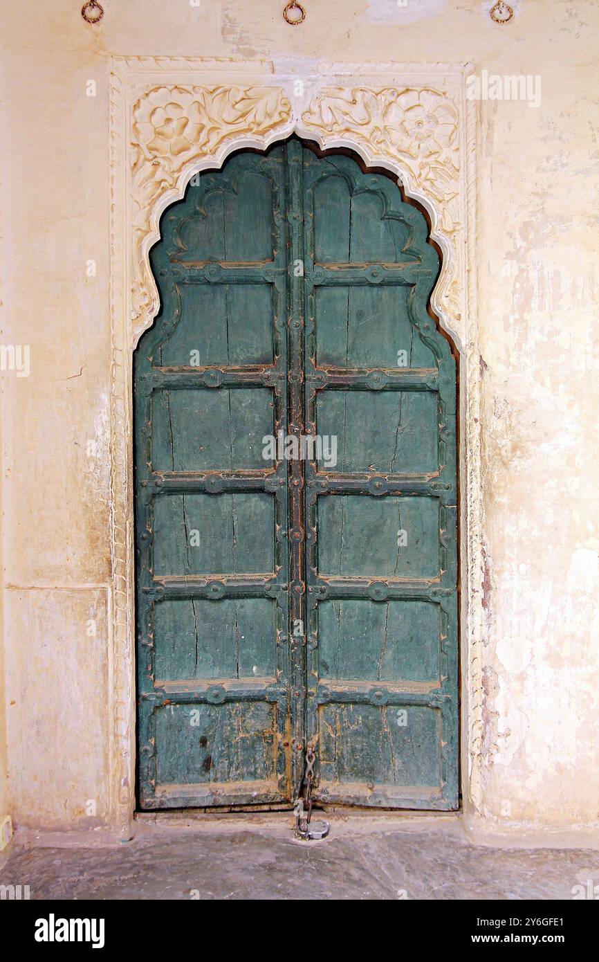 Old obsolete wooden closed door in india Stock Photo - Alamy