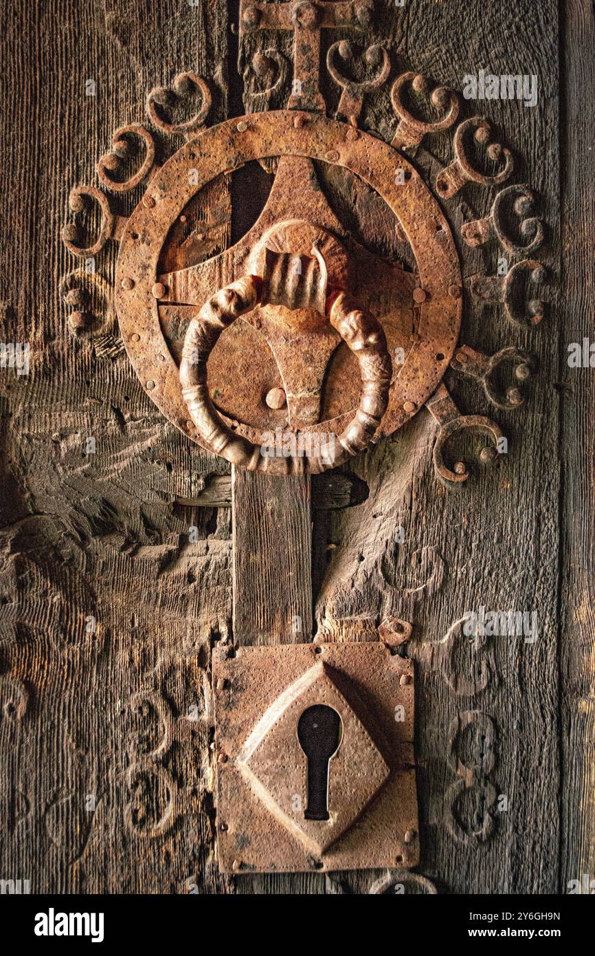 Old, Antique, Vintage and Retro rusty door lock with handle mounted on ...