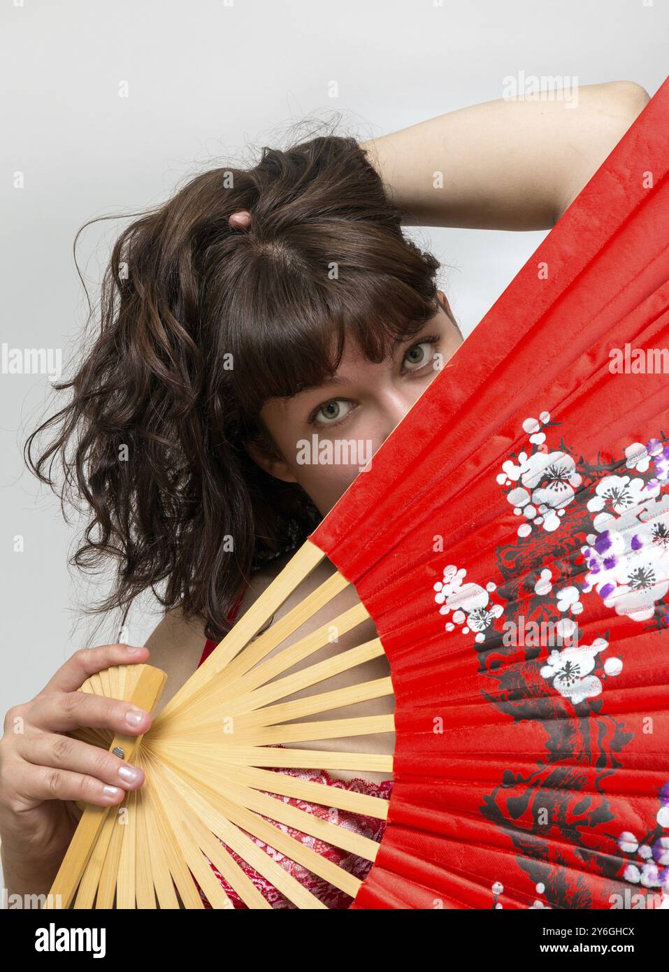 Woman with fans hi-res stock photography and images - Alamy