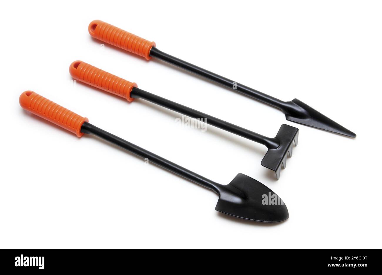 Three small gardening tools on white background Stock Photo - Alamy