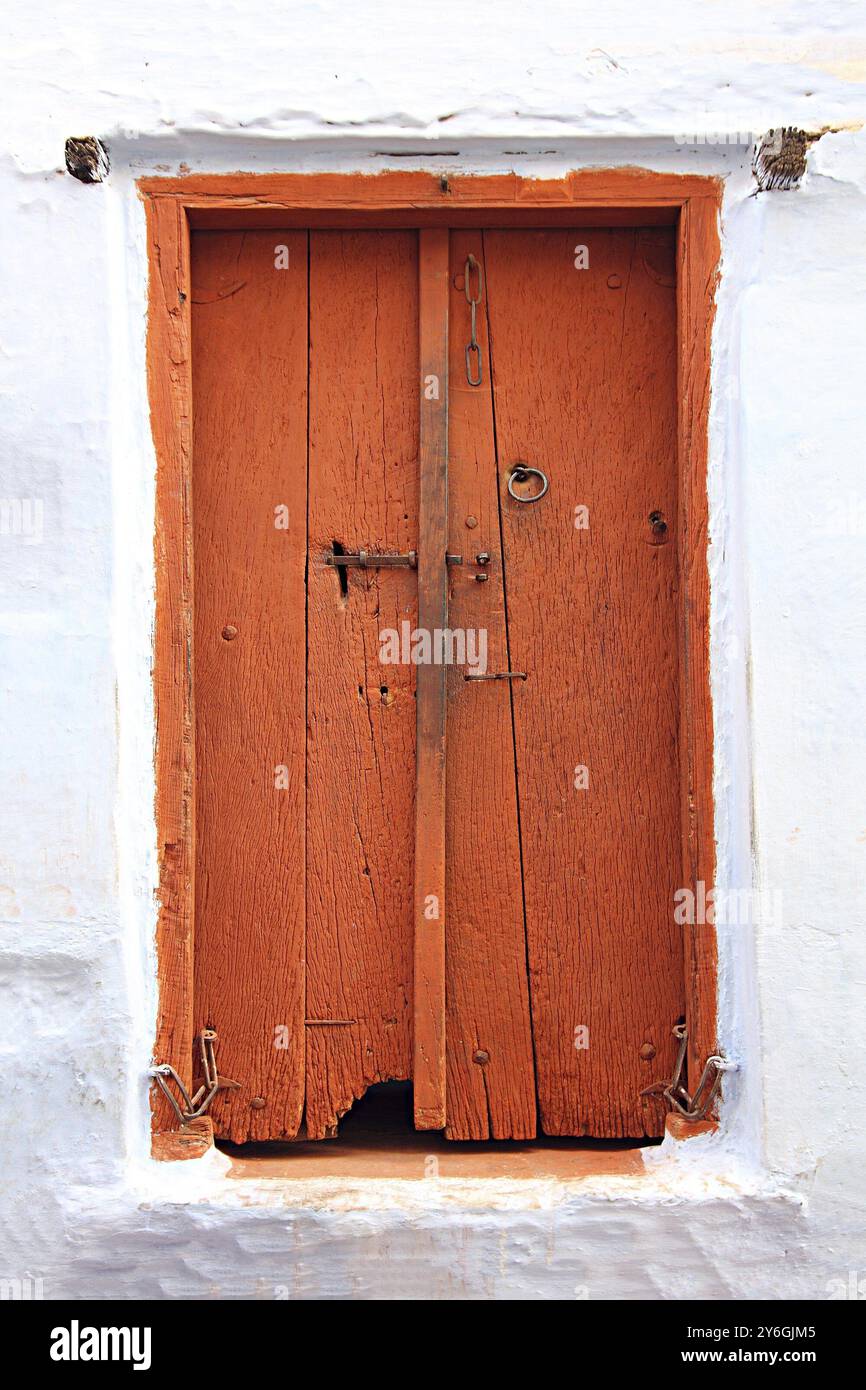 Old obsolete wooden closed door in india Stock Photo - Alamy