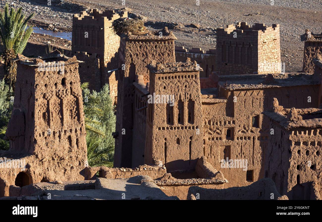 Towers of Kasbah Ait Ben Haddou in the Atlas Mountains at sunset ...