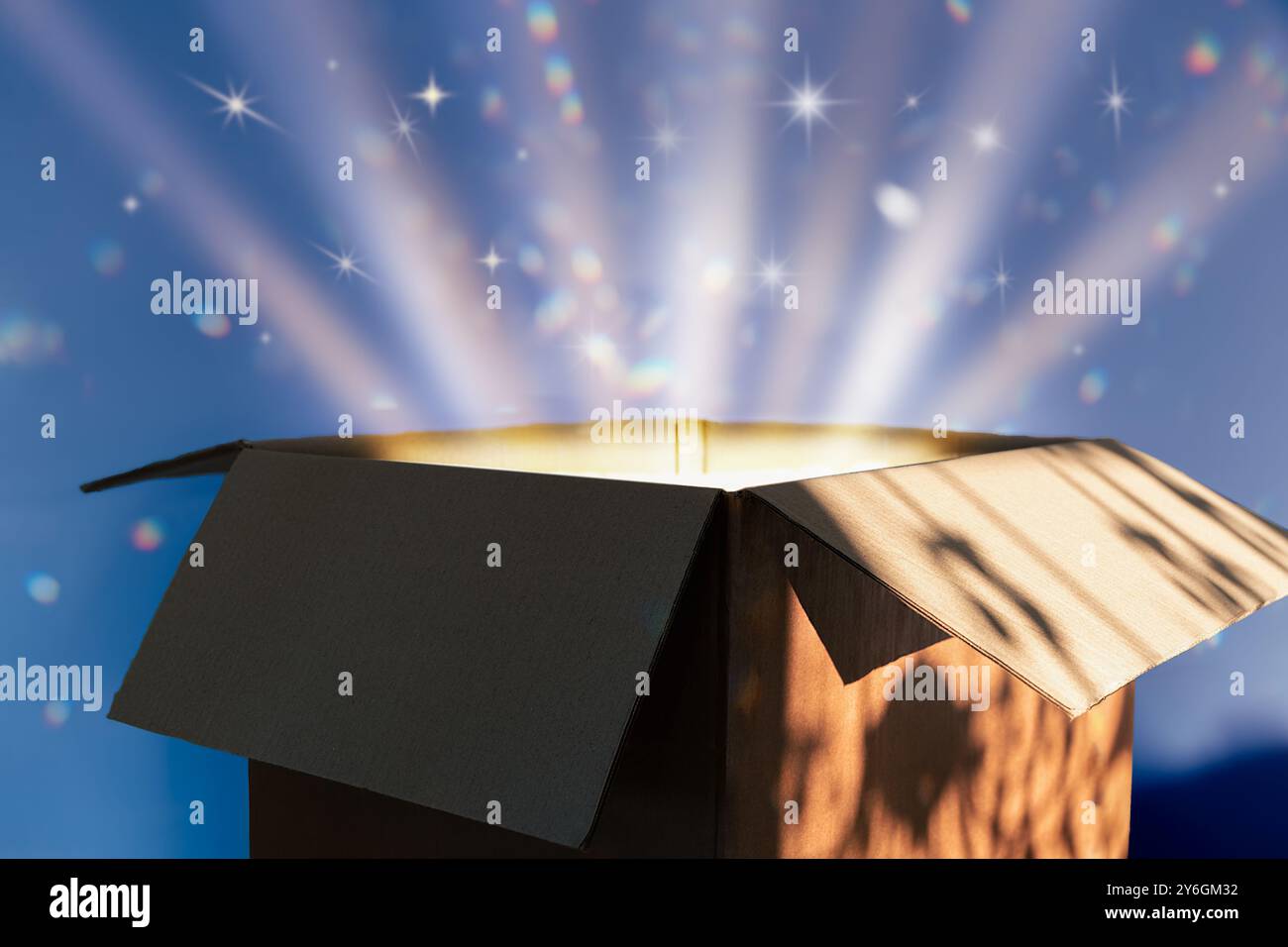 Opened magical Box with light beams and sparkles around, magical and ...