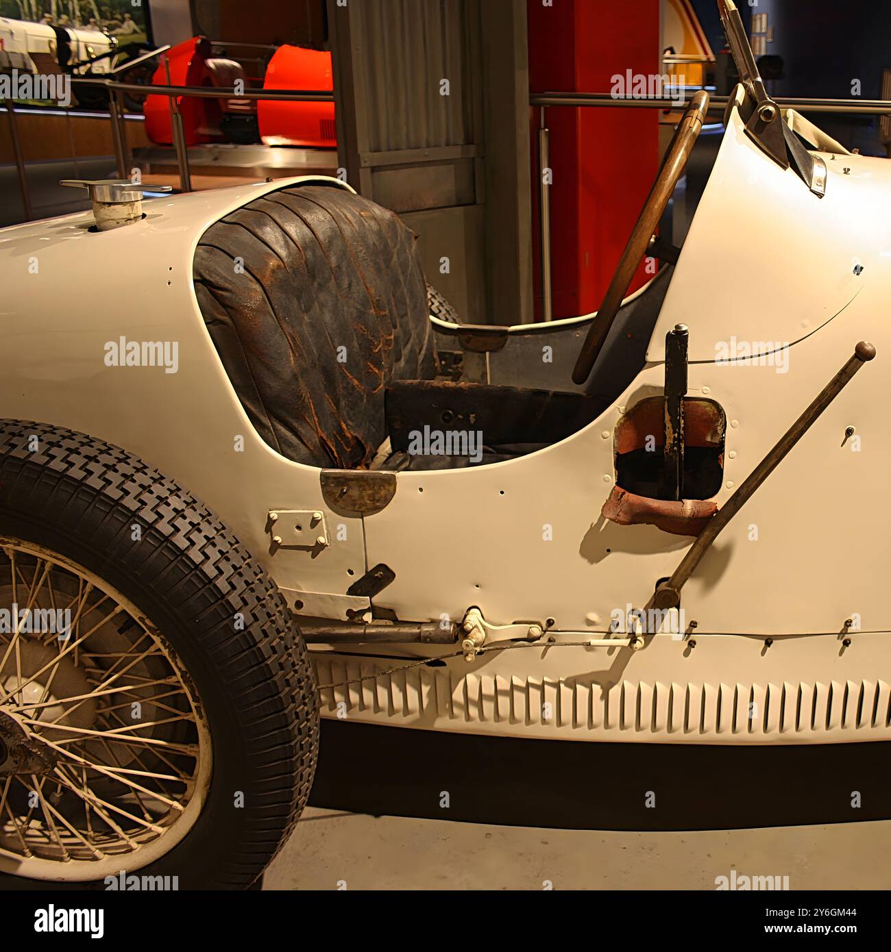 Intriguing close-up of an open classic racing car with a brown leather ...