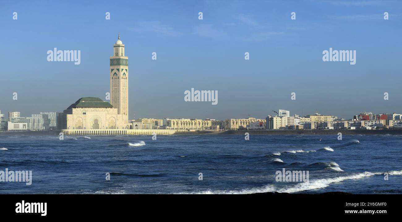 Hassan II mosque in Casablanca and Atlantic ocean waves at sunset ...