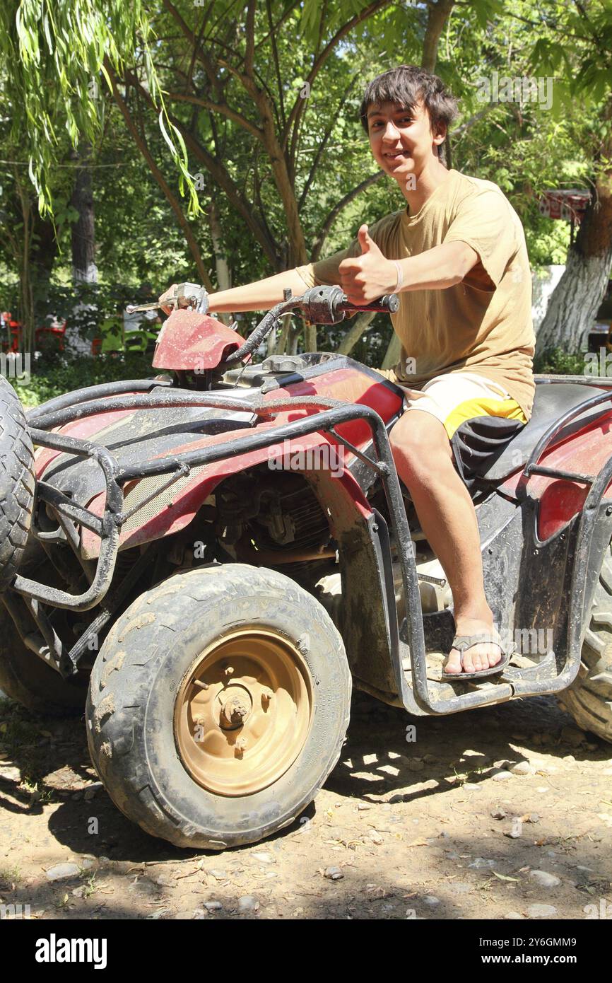 Boy quad bike hi-res stock photography and images - Alamy