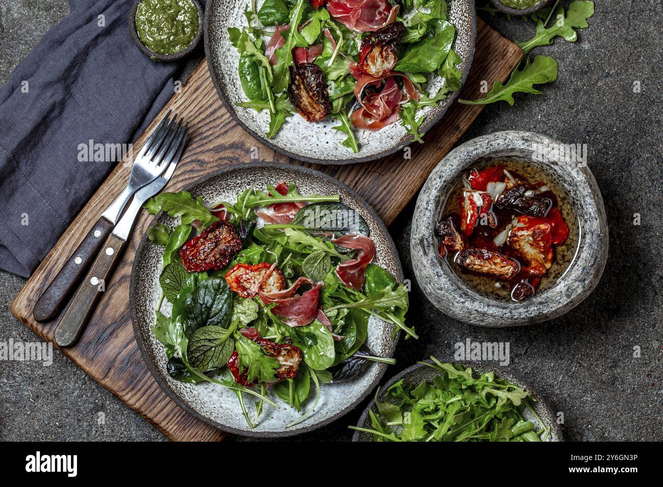Food, Salad with arugula, spinach, dried tomato and ham serrano paleta ...