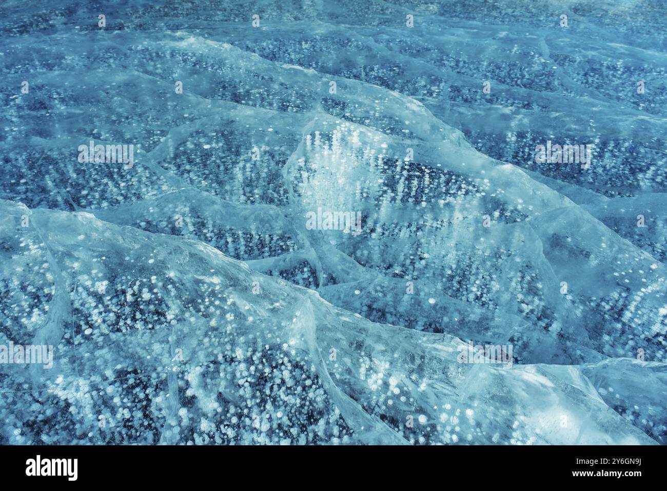 Beautiful transparent blue ice and frozen methane bubbles on Baikal ...