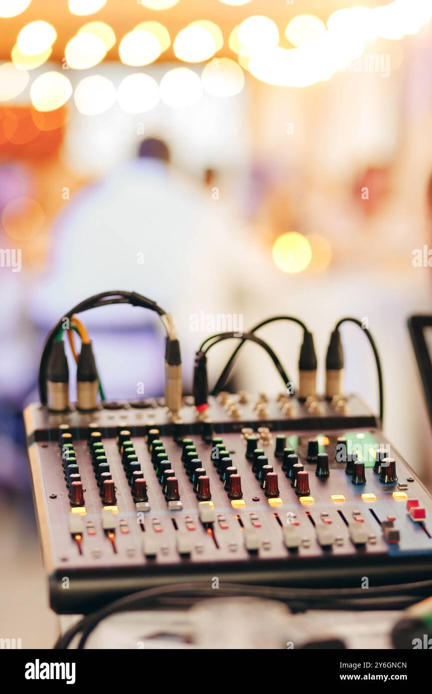 Sound mixer close-up with glowing lights on background, party Stock ...