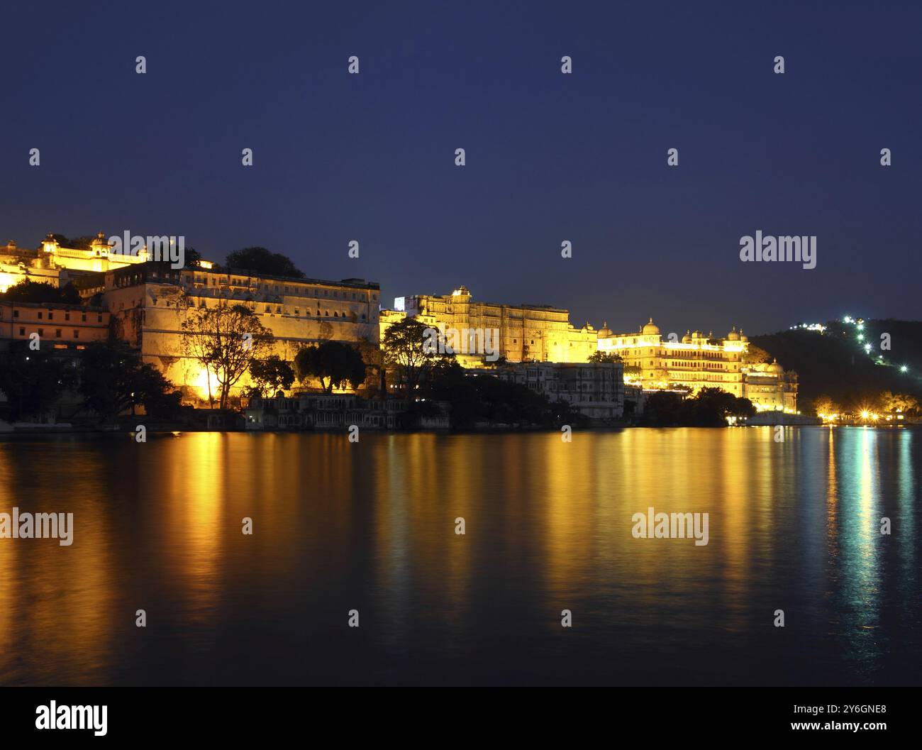 Night view on palace and lake in Udaipur India Stock Photo - Alamy