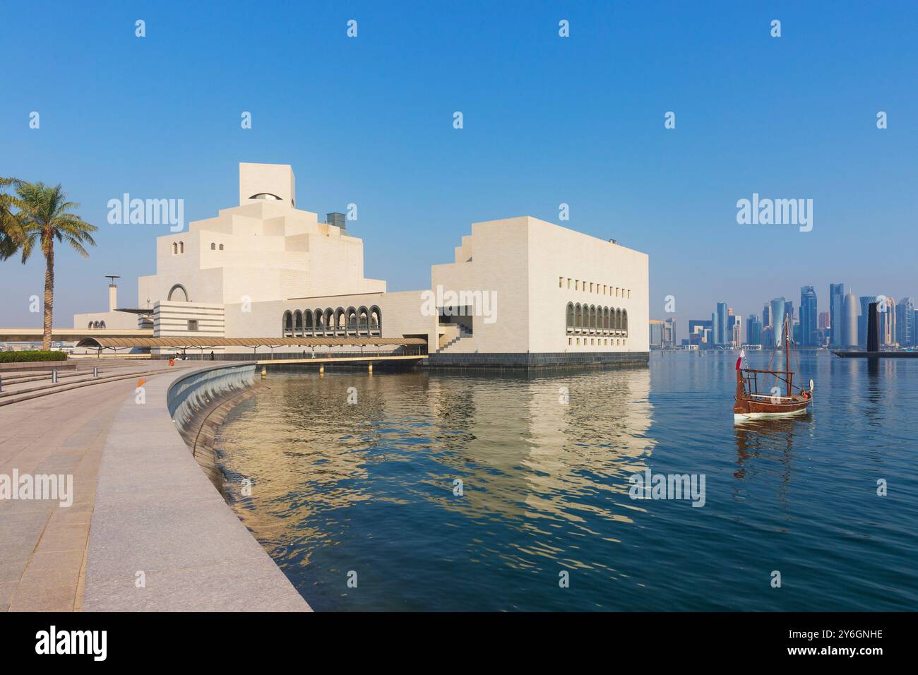 A dhow (traditional wooden sailing vessel) moored outside the Museum of ...