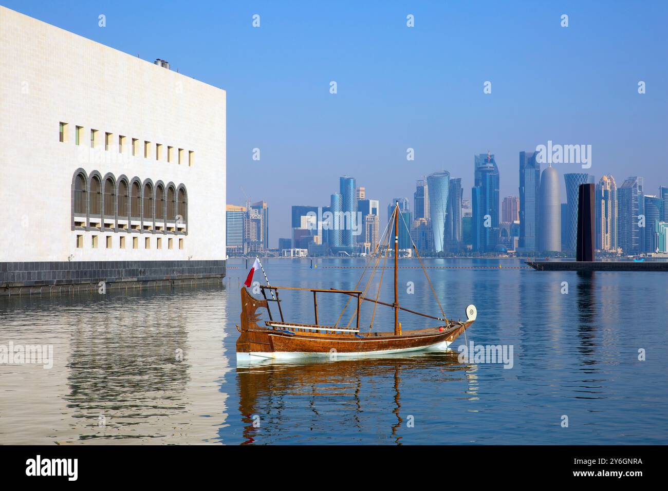 A dhow (traditional wooden sailing vessel) moored outside the Museum of ...